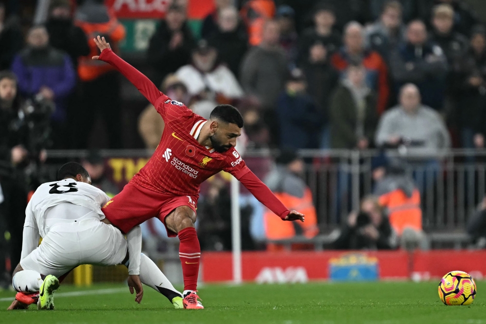 Liverpool sink Villa 2-0 to extend Premier League lead to five points ...