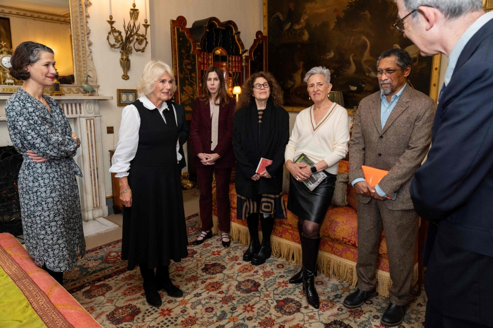 Britain’s Queen Camilla still ‘sort of coughing’ but back to some royal ...