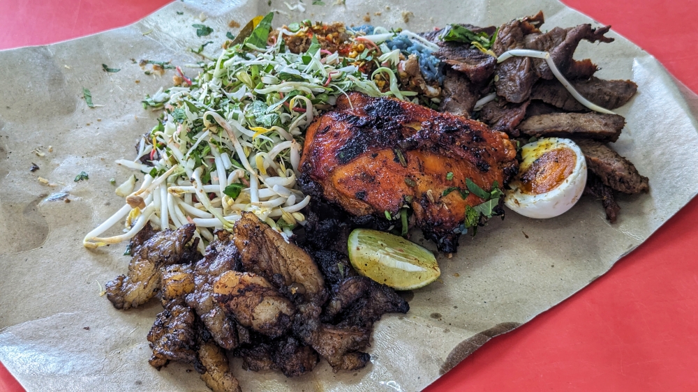 At Kota Damansara’s Stesen Nasi Kerabu, lines form out the door for the ...