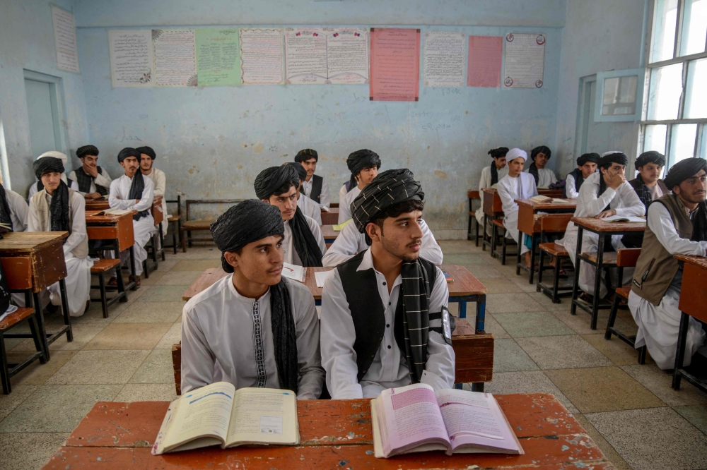 Tunics and turbans: Taliban mandates strict Islamic uniform rules in ...