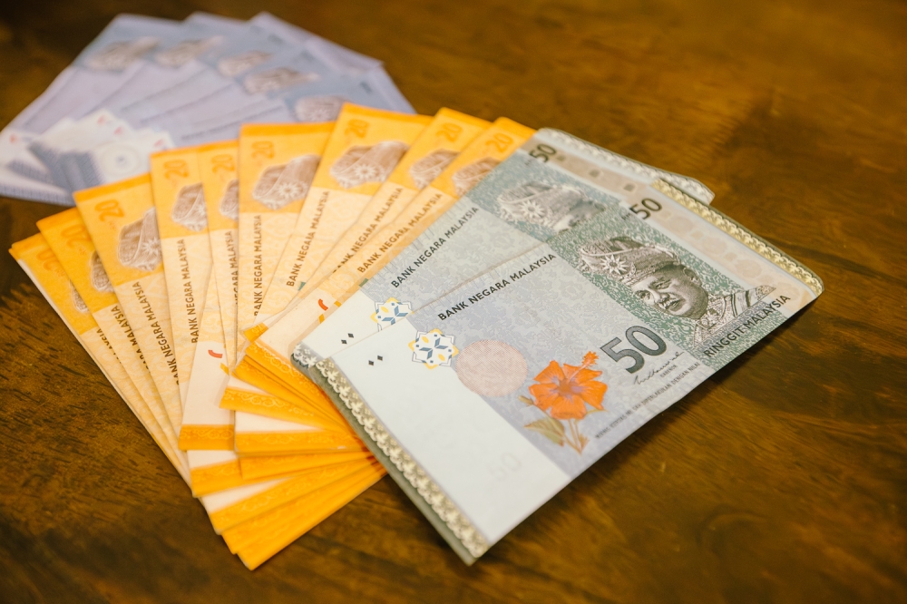 Ringgit rallies on cash aid buzz and trade deal hopes | Malay Mail