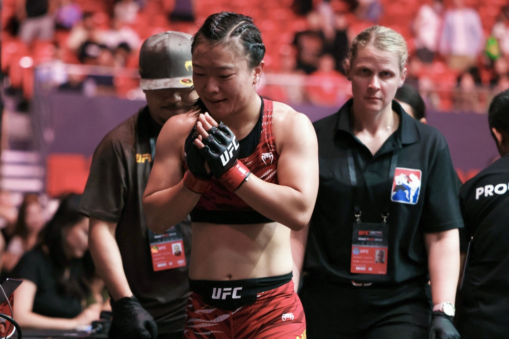 A healer and a fighter: The double life of UFC star Shi Ming | Malay Mail