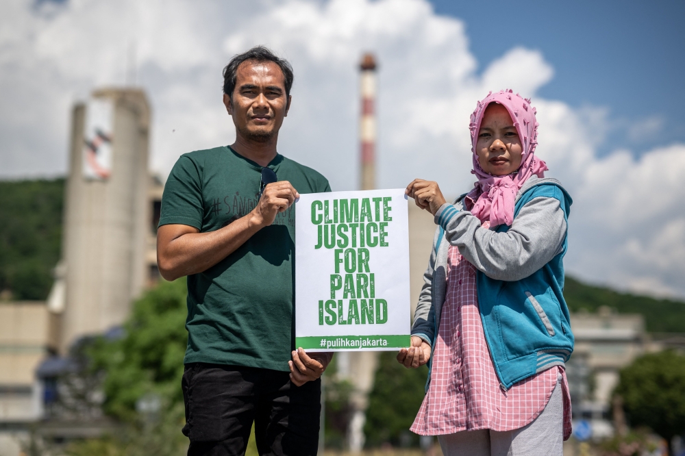 As seas rise, Indonesian islanders put Swiss cement giant Holcim in the ...