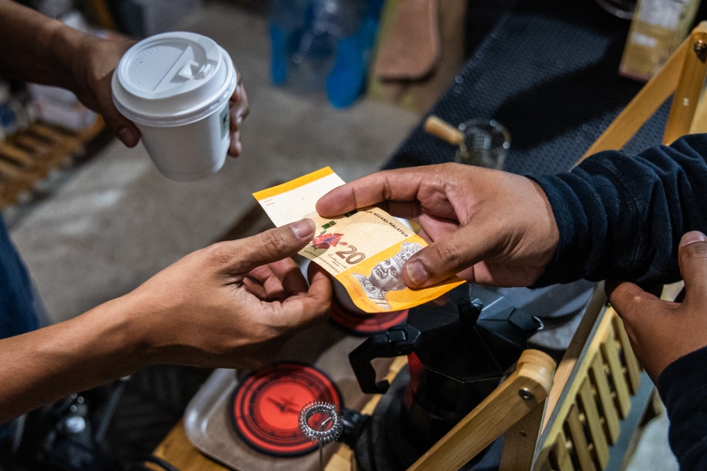 Ringgit opens stronger against US dollar on softer Fed outlook | Malay Mail