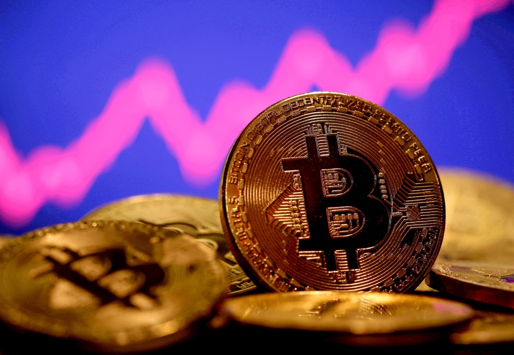 Bitcoin hits record high above US$125,000 | Malay Mail