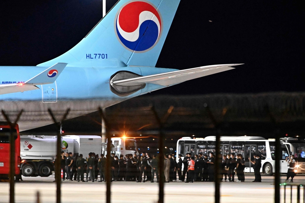 Flown home to Seoul, 64 South Koreans now face arrest over Cambodia ...