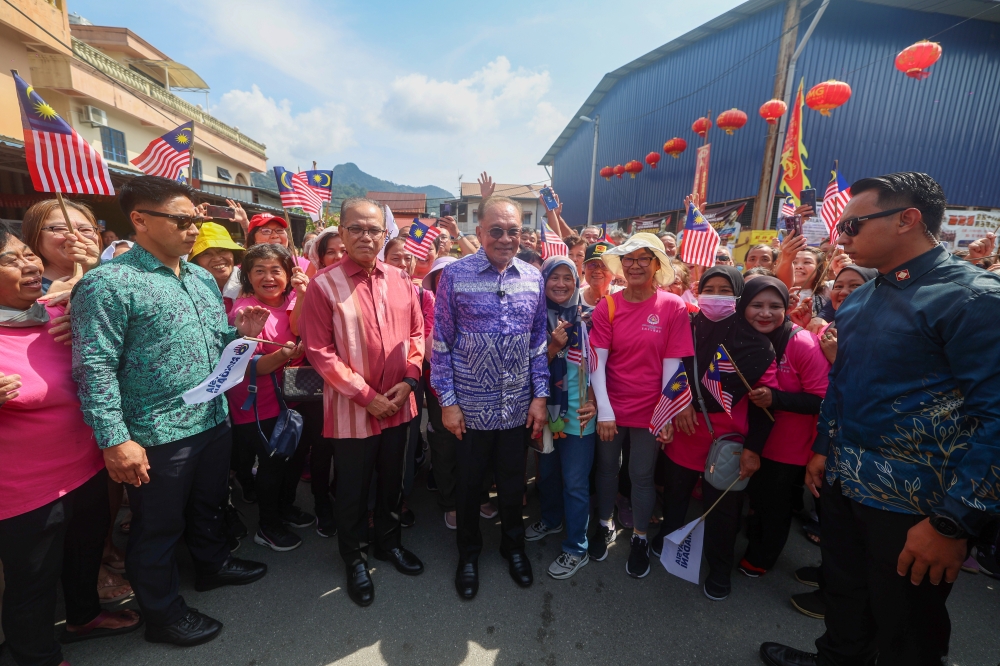 Anwar urges end to language disputes, says focus must shift to children ...