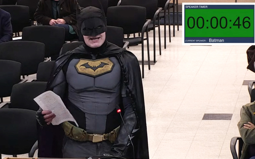 Ker-pow! ‘Batman’ crashes California city meeting to fight ICE at Super ...