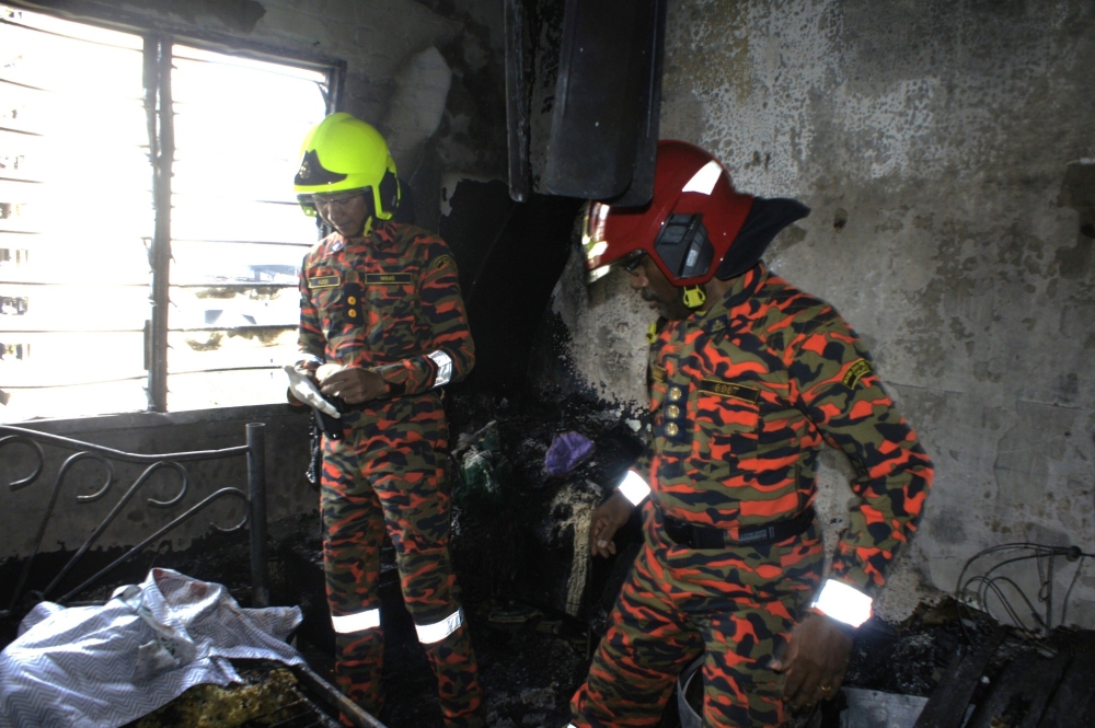 KL Bomba discover boy’s remains after fire guts 10th-floor PPR flat in ...