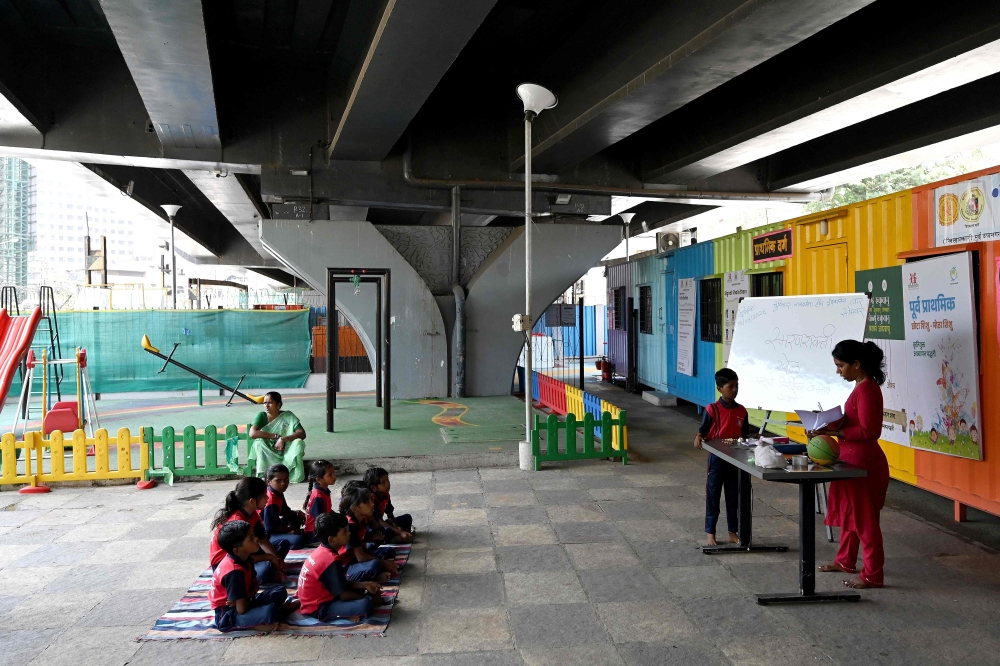 Pastel containers under Mumbai flyover turn into joyful classrooms for ...