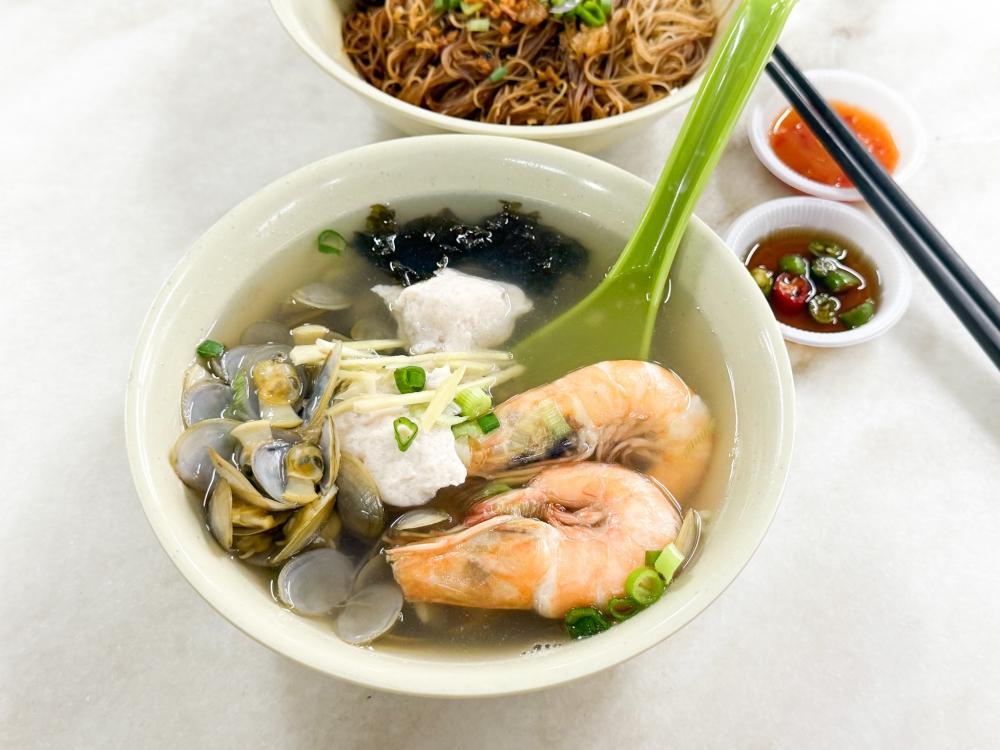 The early bird catches this top notch bowl of seafood noodles at ...
