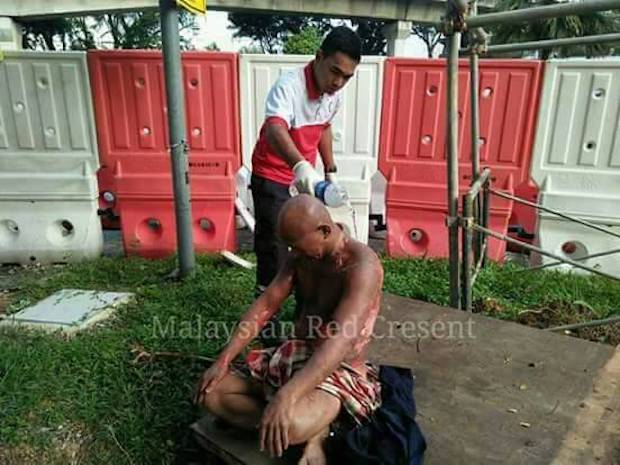 Police confirm authenticity of viral photo showing man splashed with ...