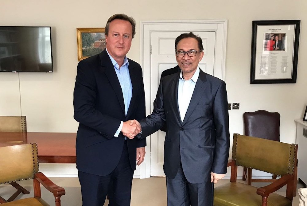 Anwar talks jail and 1MDB with ex-UK PM David Cameron in London meet ...