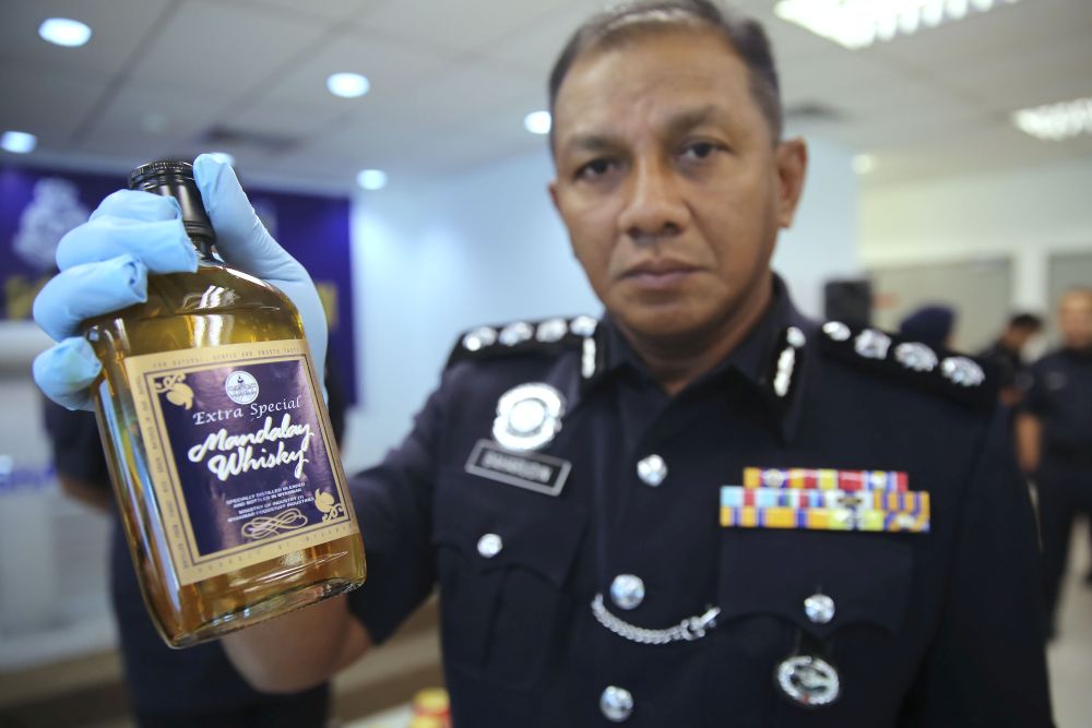 Selangor cops cracking down on illegal booze sale after fatalities ...