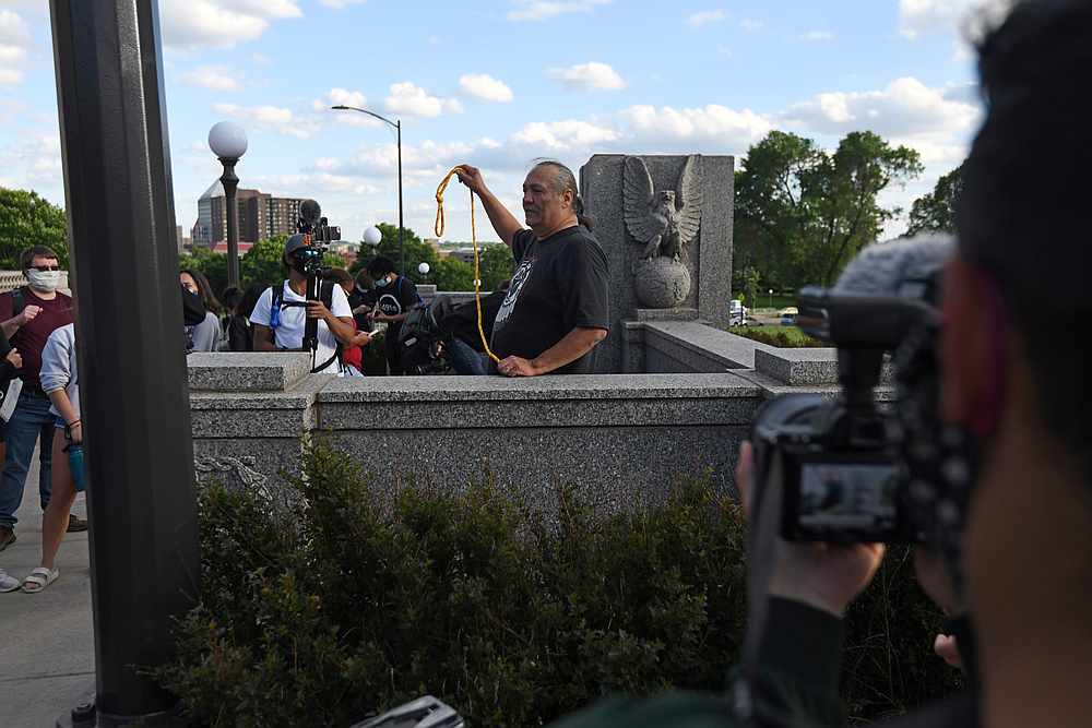 Protesters tear down Christopher Columbus statue in Saint Paul ...