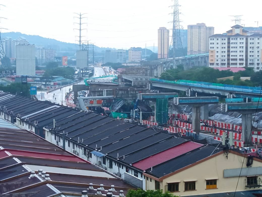 Five in van feared trapped after scaffolding collapses at flyover along ...