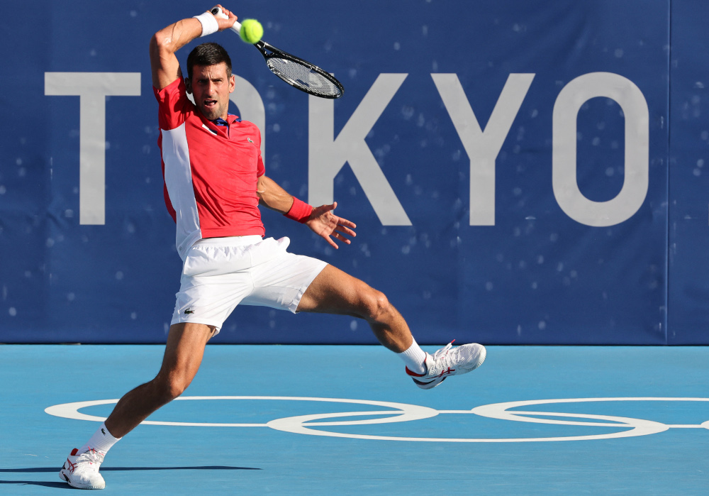 Djokovic rolls at Olympics as Medvedev suffers in extreme heat | Malay Mail