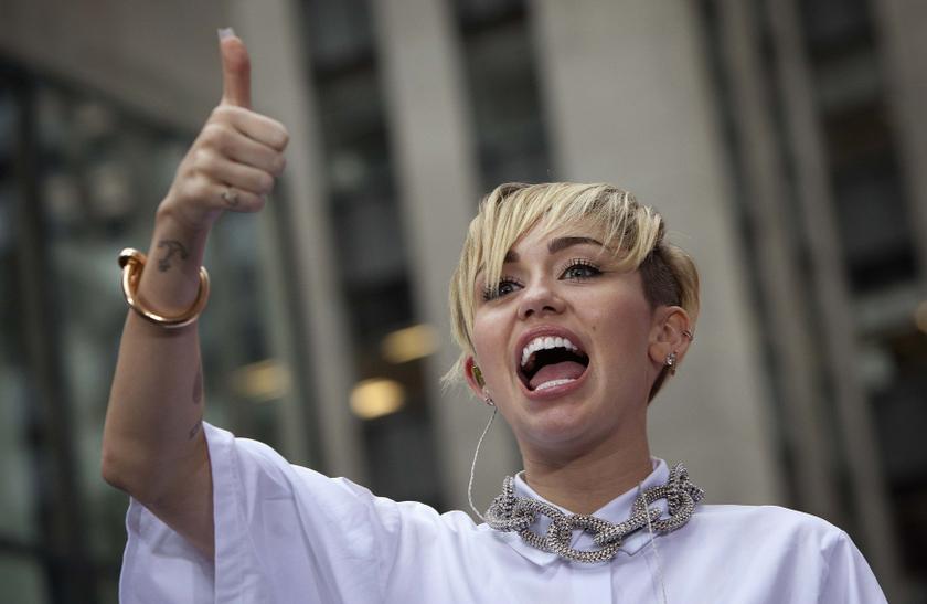Miley Cyrus grabs top slot in UK single and album charts | Malay Mail