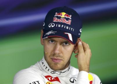 Champion Vettel slams double points plan | Malay Mail